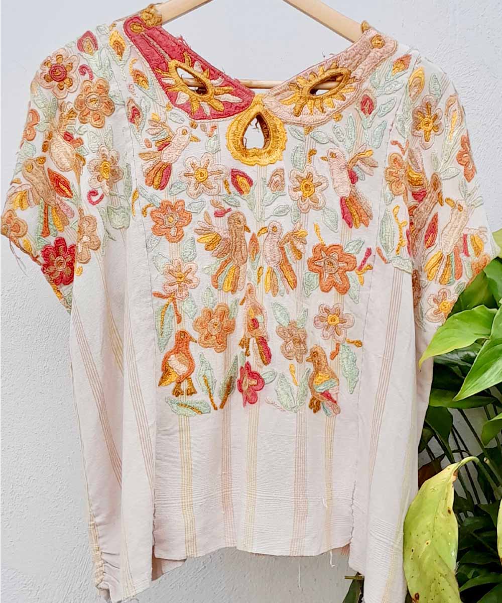 White huipil with flowers and birds